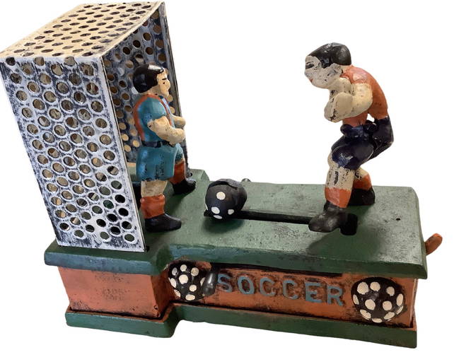 Repro cast iron mechanical bank w/soccer theme, 2 levers, removable ...