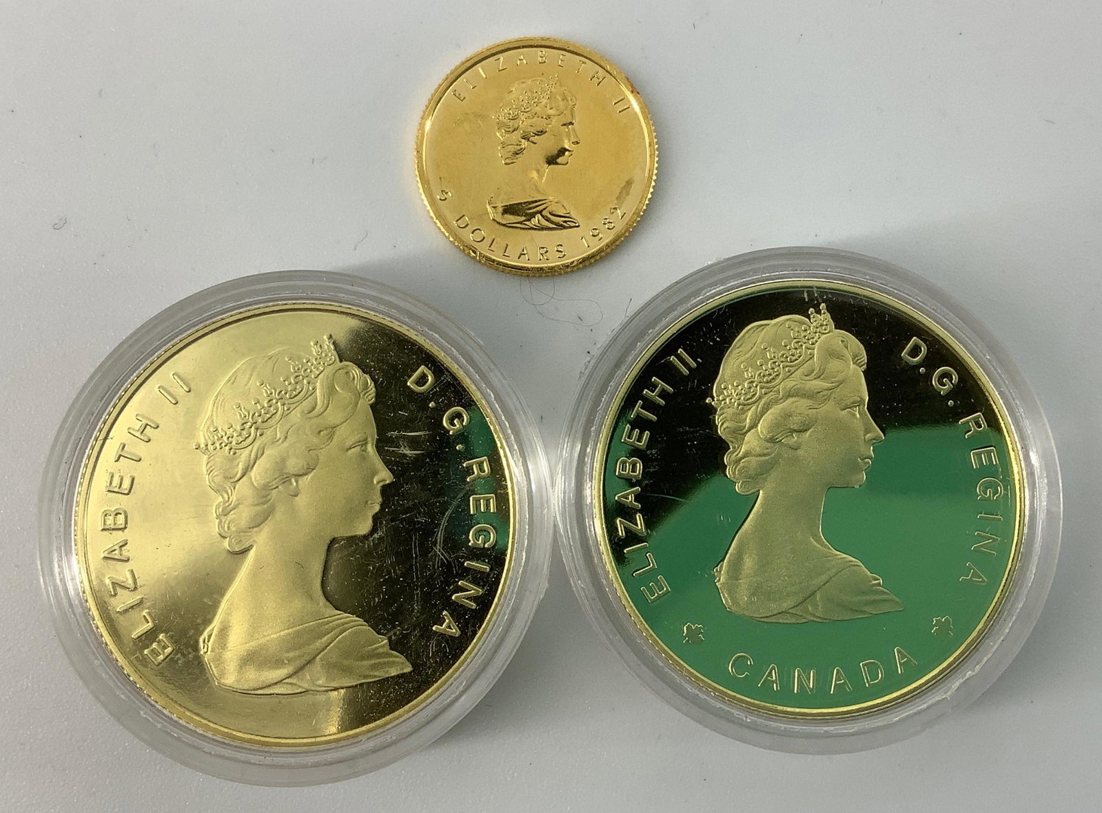 Three Gold Canadian Coins