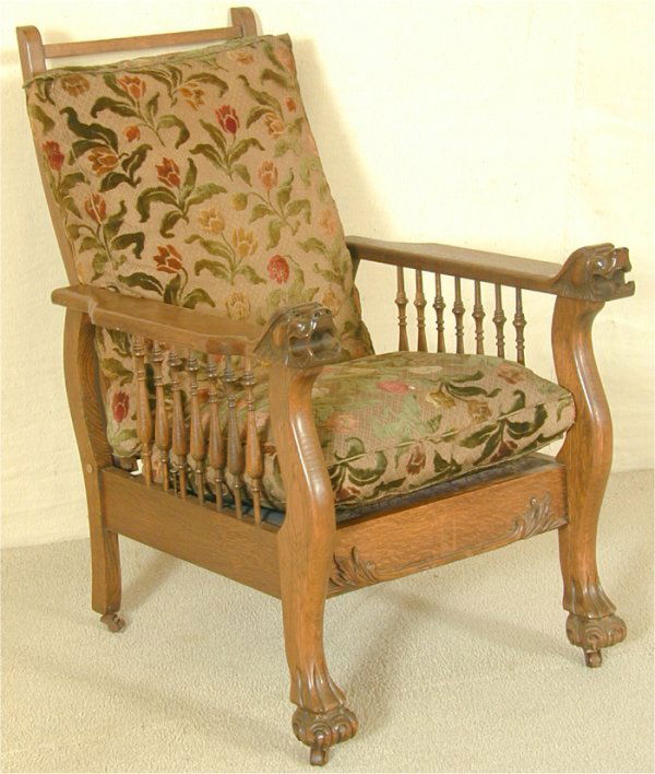 5237: OAK MORRIS CHAIR W/LION CARVED ARMS,