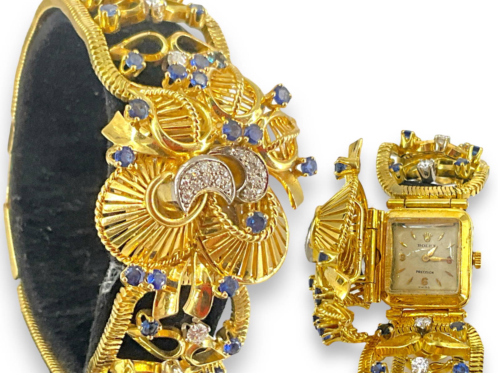 18kt Gold Encased/hidden Wrist Watch With Sapphires And Diamonds Auction