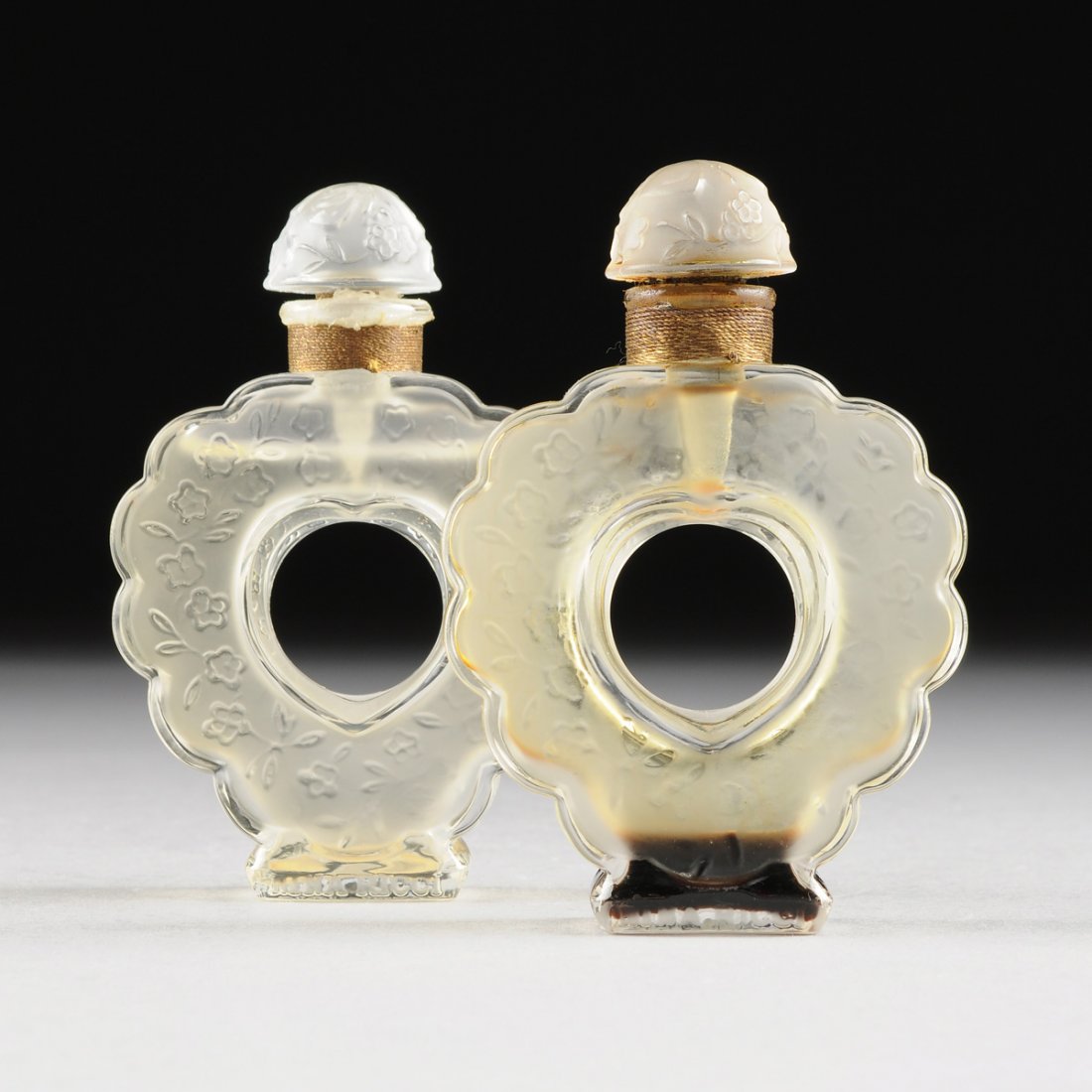 A PAIR OF LALIQUE CRYSTAL "COEUR-JOIE" PERFUME BOTTLES,