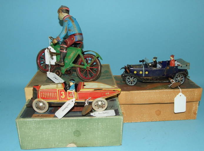 Three Modern Tinplate Clockwork Toys, With Boxes And