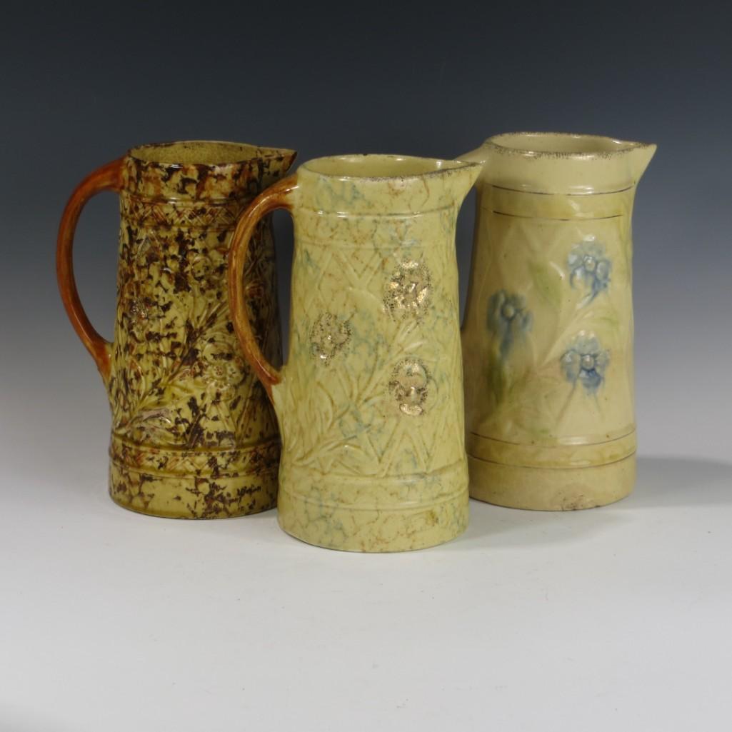 Three Roseville Early Carnelian Pitchers