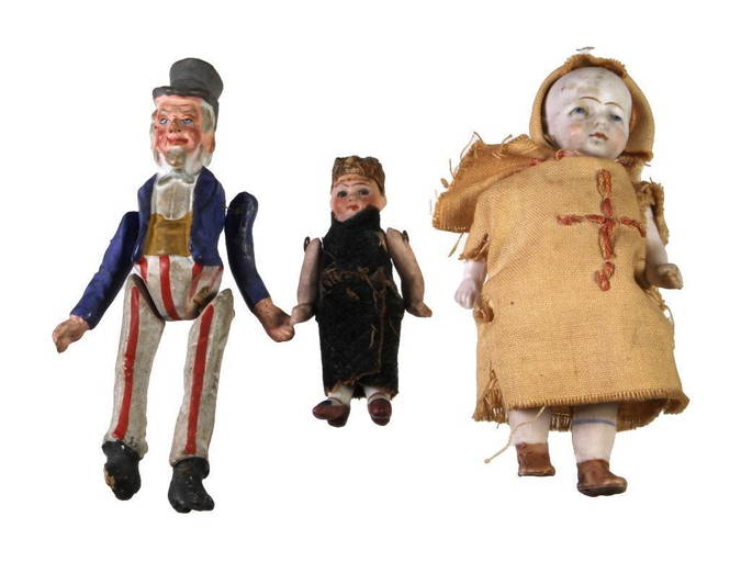 Three Bisque Dolls Including Uncle Sam