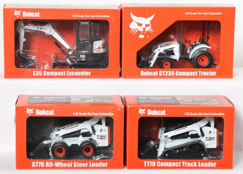 Four Bobcat 1:25th diecast toys in original boxes
