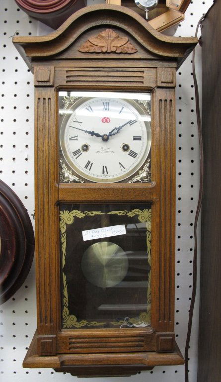 317: Pendulum 31-Day Wall Clock by 555