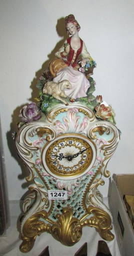 A Capo Di Monte Style Clock With Battery Movement