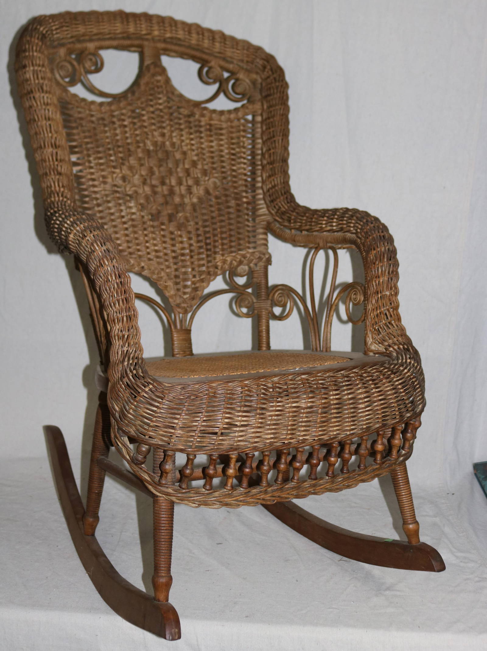 Ornate Victorian Wicker Rocker, Rolled Arms, Auction