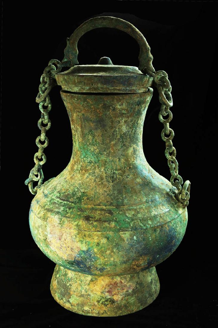 LARGE ARCHAIC BRONZE LIFTING HANDLE POT, HAN DYNASTY,