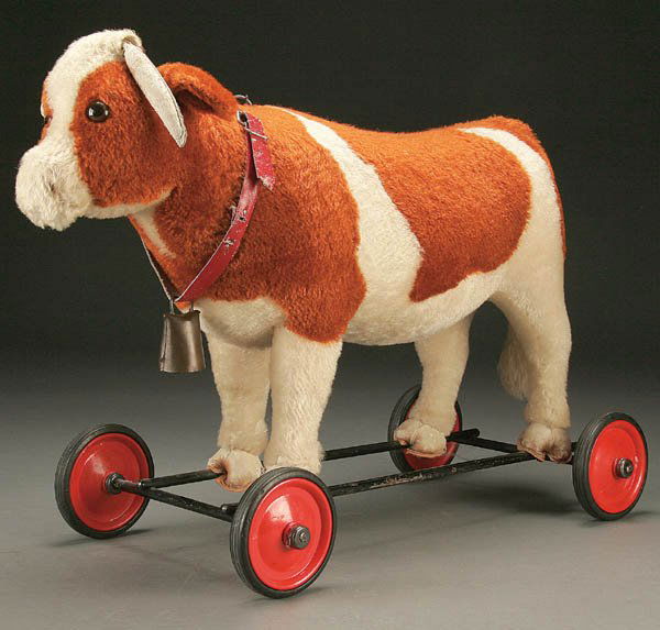 335: A STEIFF COW PULL TOY mid 20th century raised on