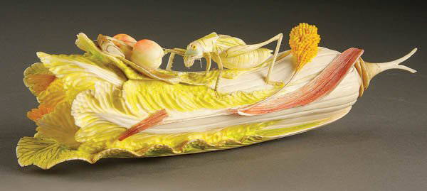 A Chinese Carved Ivory Grasshopper On Cabbage Pla