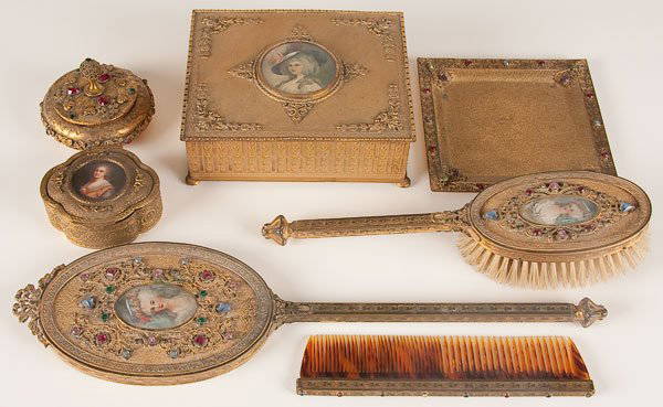 A 6 Piece Apollo Gilt Bronze Jewel Encrusted Dress