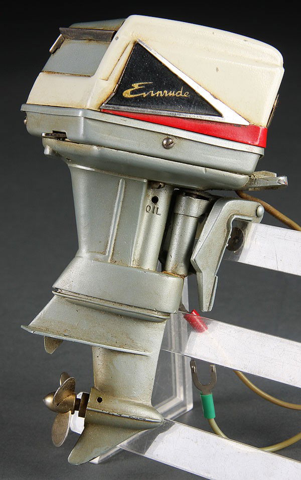 1204: A 1960 K&O EVINRUDE 75HP STARFLIGHT TOY OUTBOARD