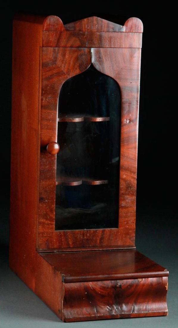 AN EMPIRE MAHOGANY DRESSER TOP WIG CABINET
