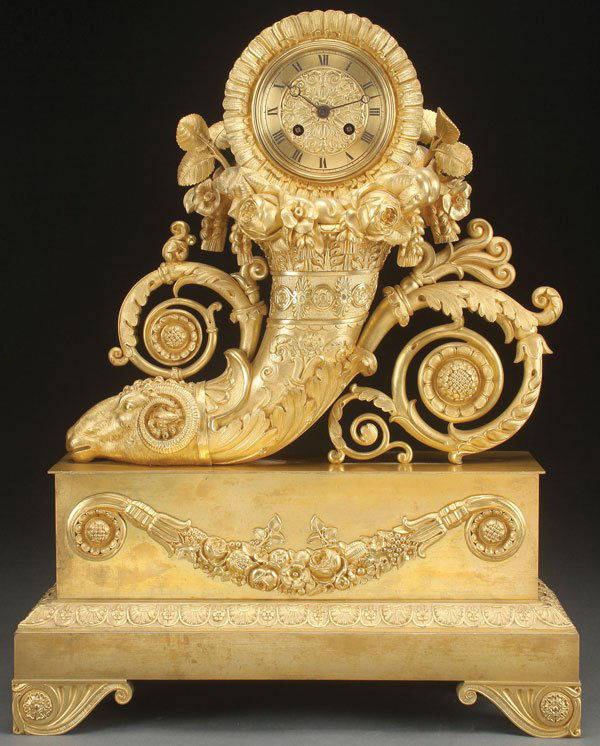 A FINE FRENCH EMPIRE STYLE GILT BRONZE CLOCK