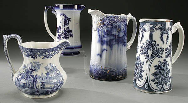 Very Fine Collection Of Four Flow Blue Pitchers I