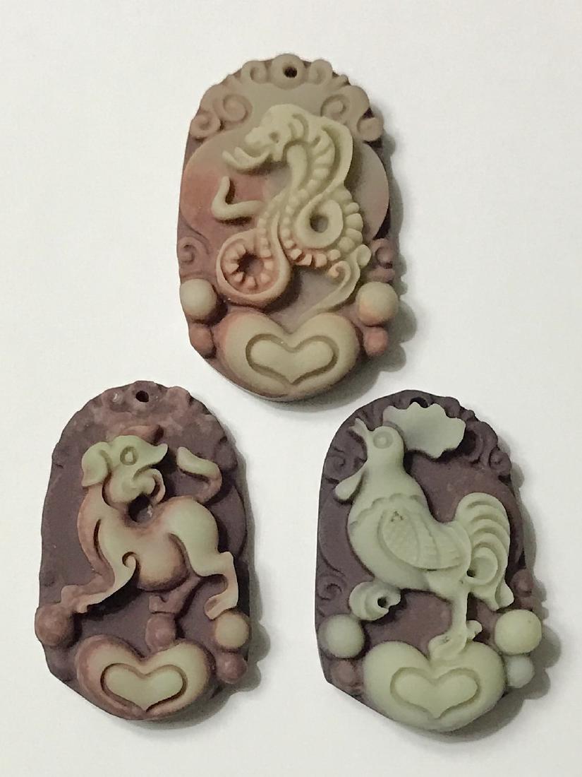 Early Chinese Hand Carved Purple Jade Amulets