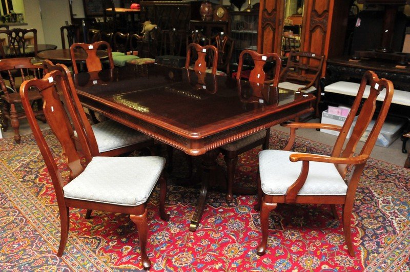 A Large Reproduction Dining Table On Twin Pedestal With