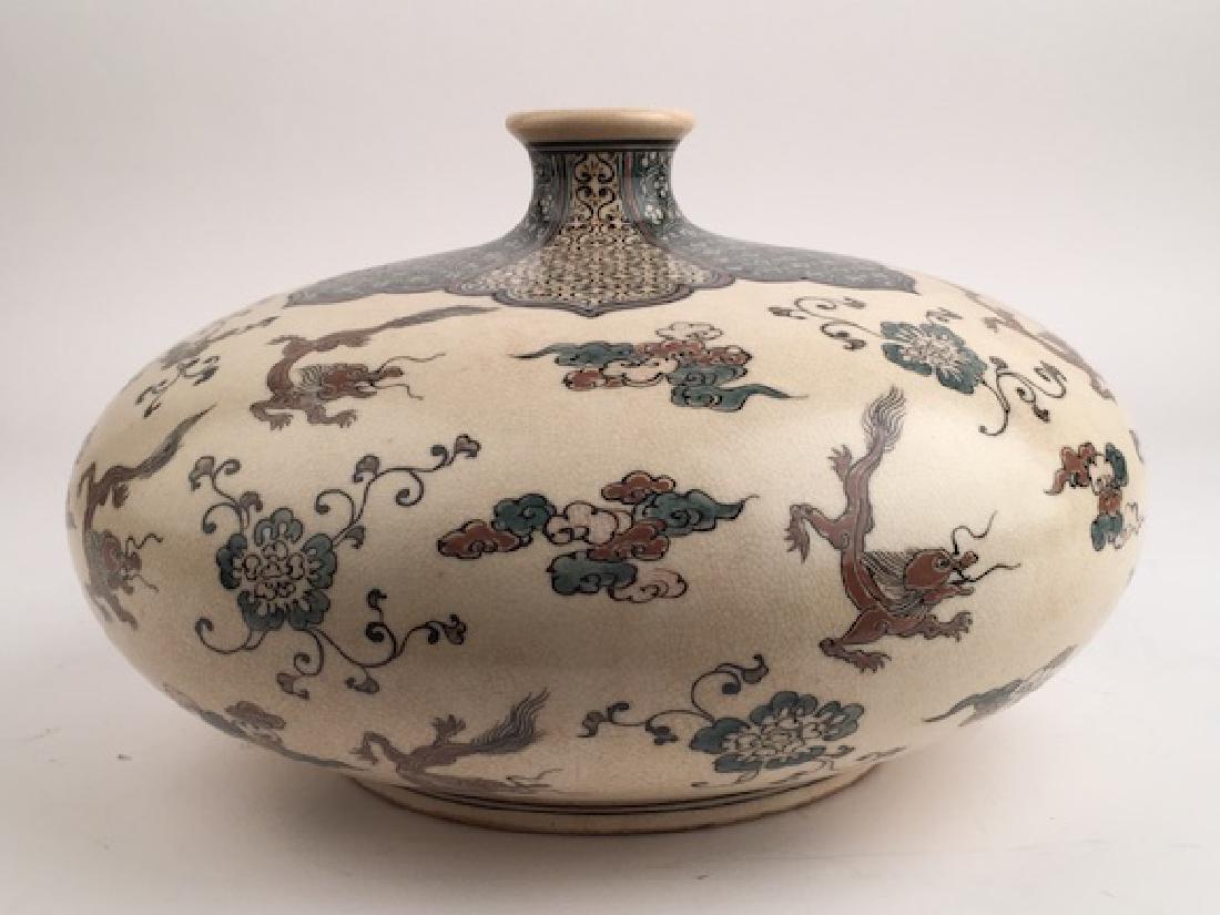 Circa 1900 Ito Tozan Japanese squat shaped vase.