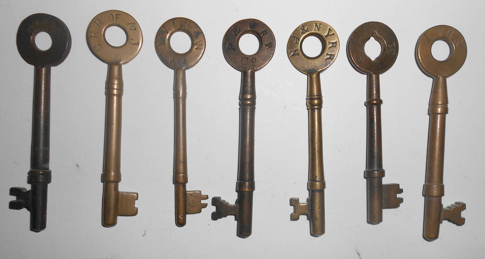 7 Very Old Coach / Caboose Keys all are marked (#0253) on Apr 22, 2023 ...