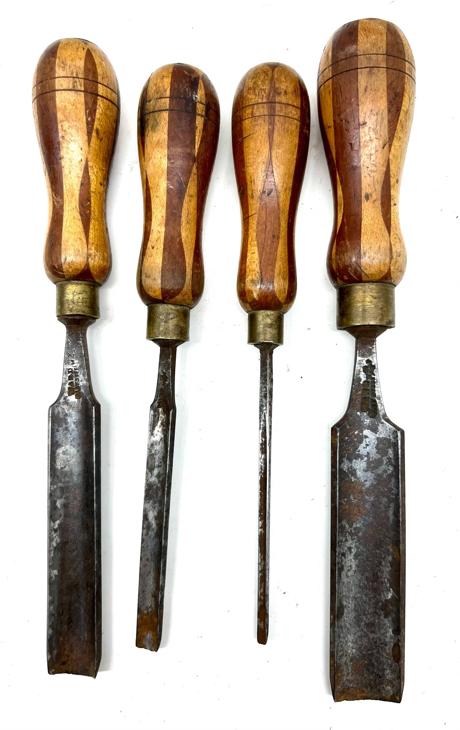 Four Gouges With Decorative Laminated Handles. Auction