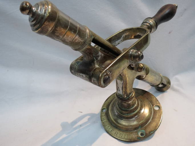 An Antique Brass Bar Top, Cork Extractor