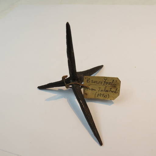 A Crowsfoot Or Caltrap Anti Cavalry Device, Labelled