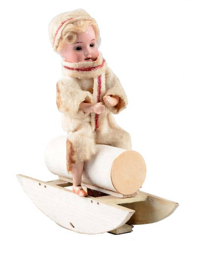 German Child On Wind Up Rocker.