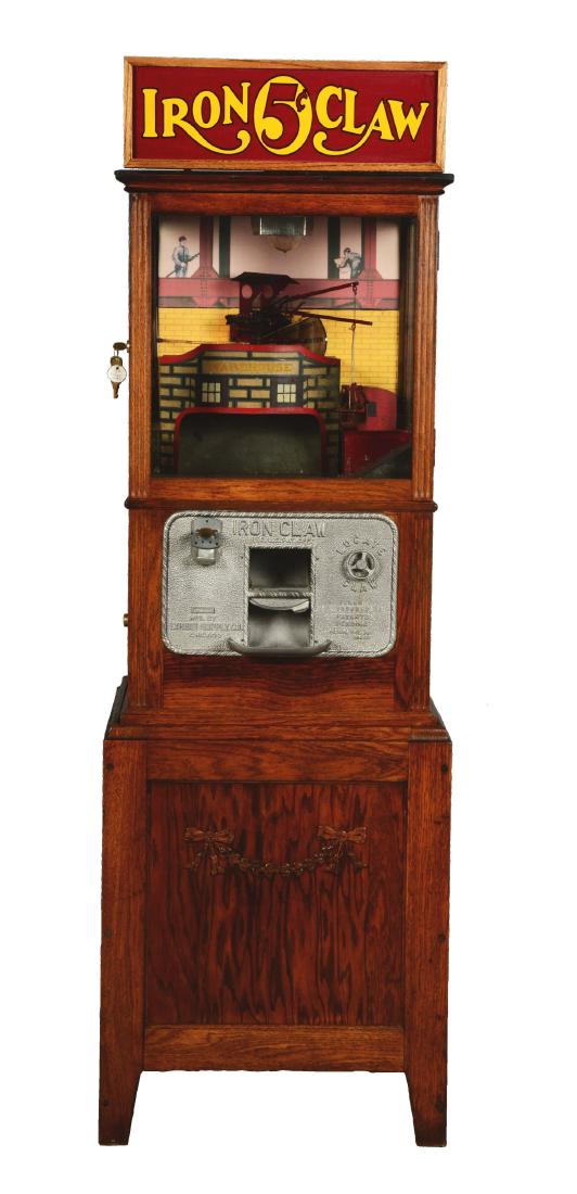 5¢ Exhibit Supply Co. Iron Claw Machine.