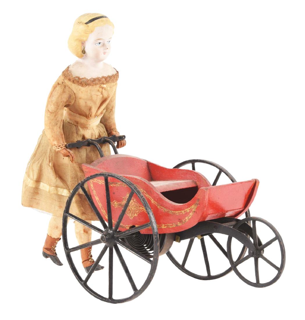 Goodwin Hawkins Doll Pushing 3 Wheeled Cart.