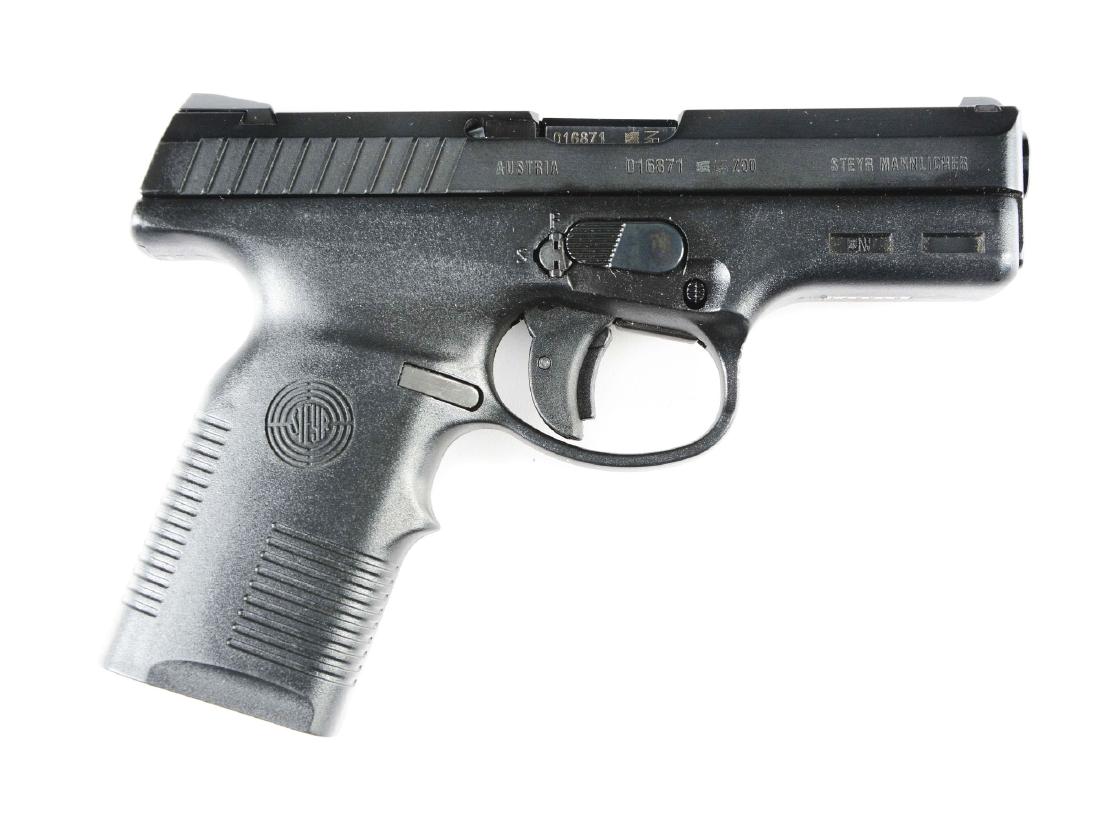 (M) Cased Steyr M40 Semi-Automatic Pistol.