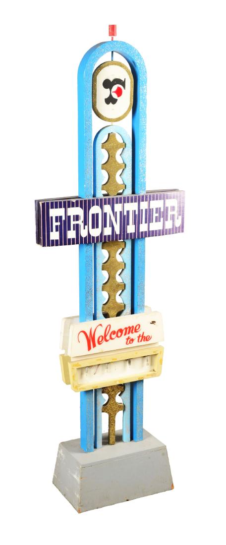 Frontier Hotel Spinning Light Up Sign.