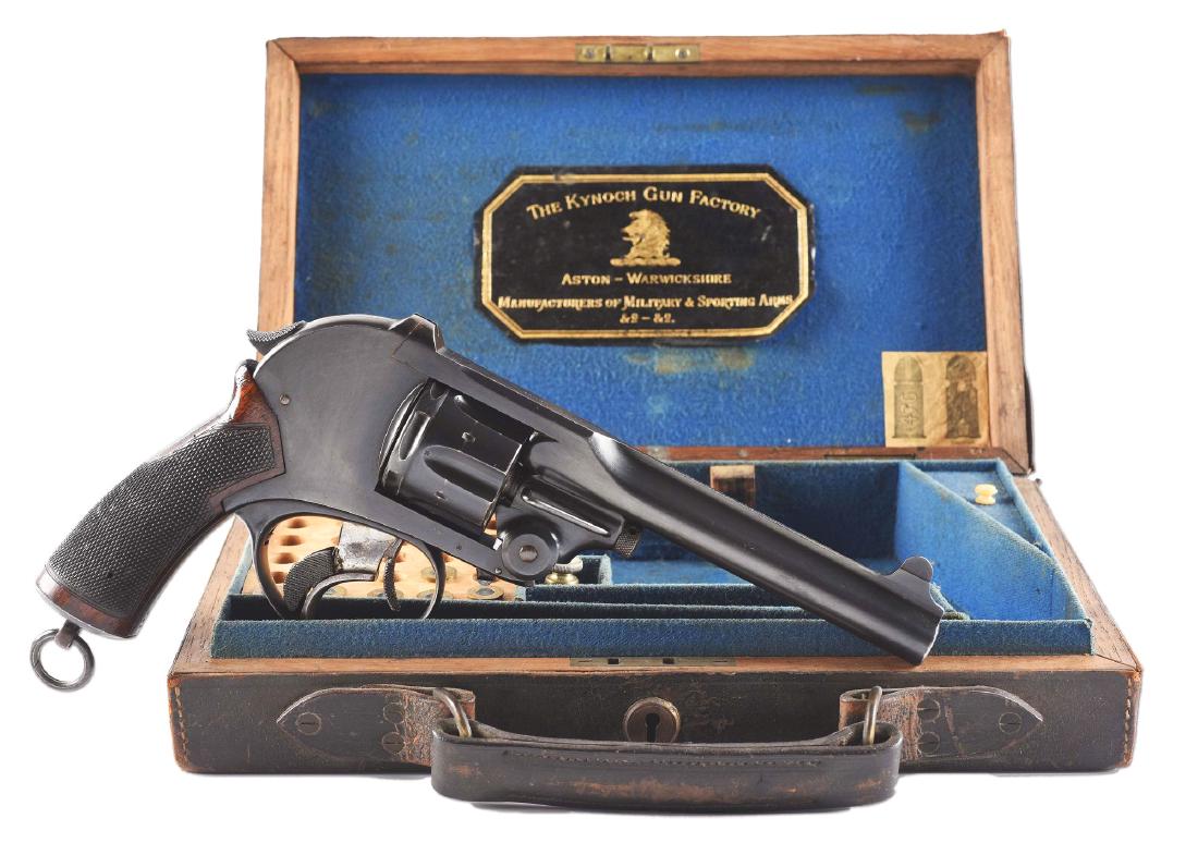 (A) Factory Cased Kynoch Double Action Revolver.