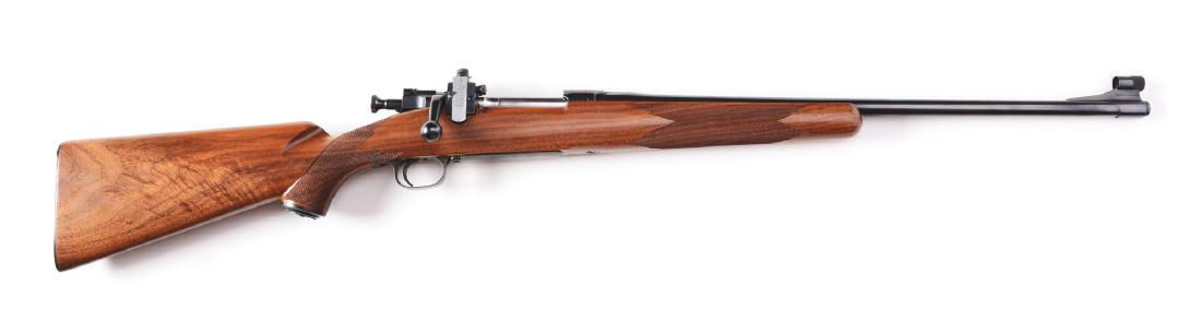 (C) Springfield M1903 Custom Bolt Action Rifle.