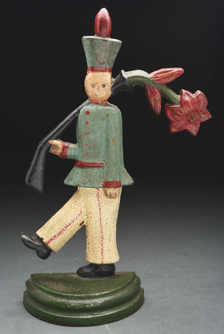 Rare Soldier with Flower in Gun Doorstop.