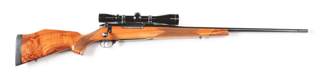 (m) Weatherby Mark V Bolt Action Rifle With Leupold