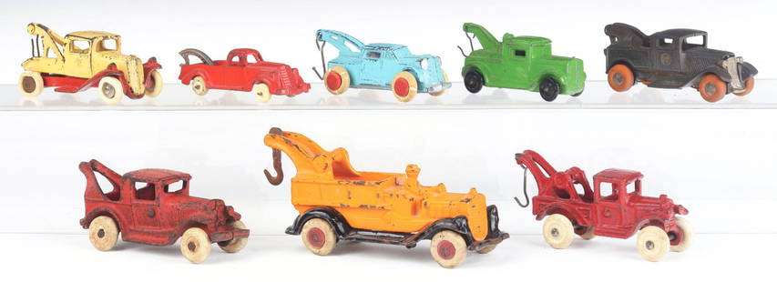 Lot Of 8: Various Cast Iron And Slush Mold Tow Trucks.