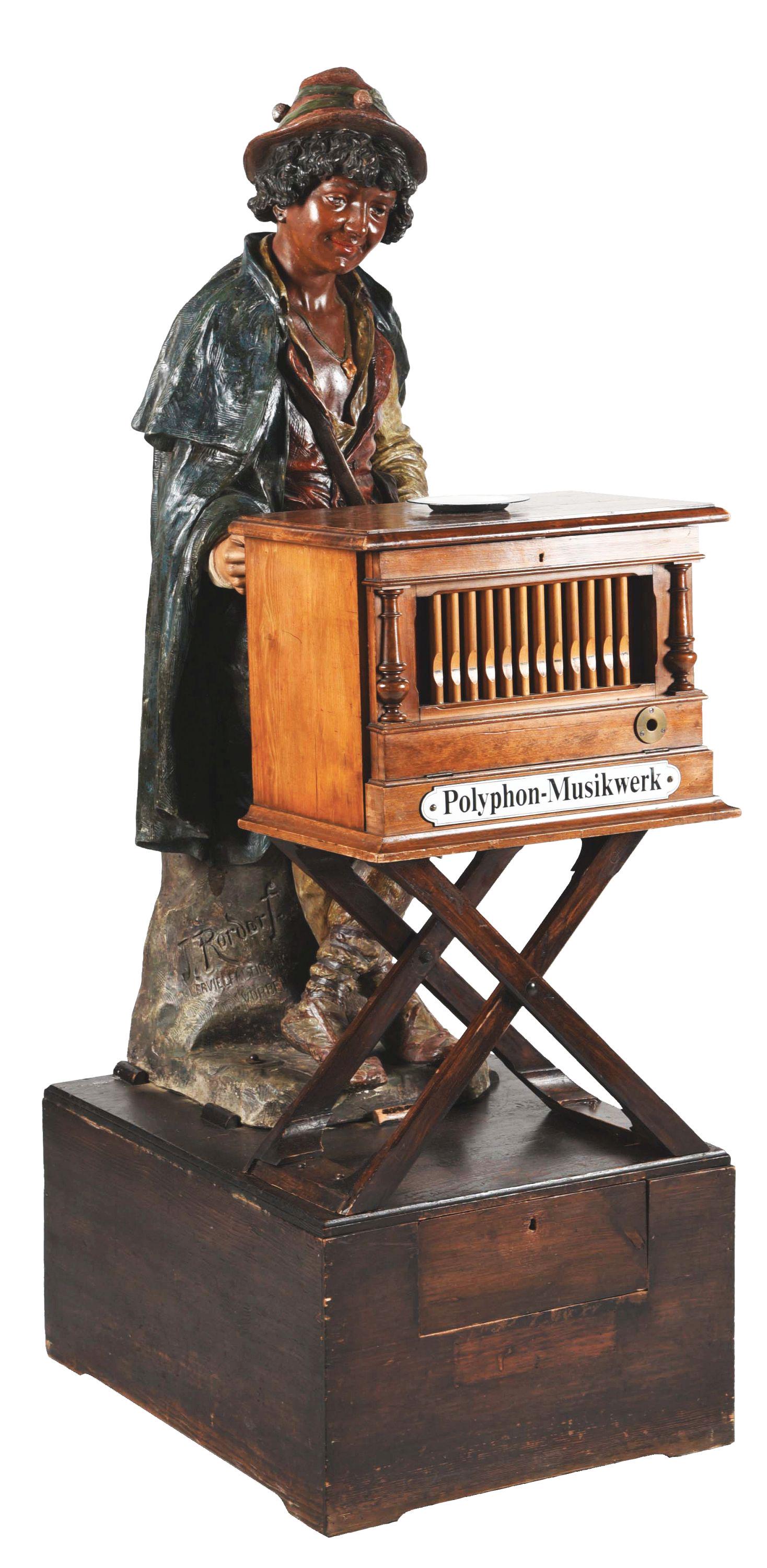 POLYPHON 11 1/4" "SAVOYARD" COIN OPERATED MUSIC BOX.