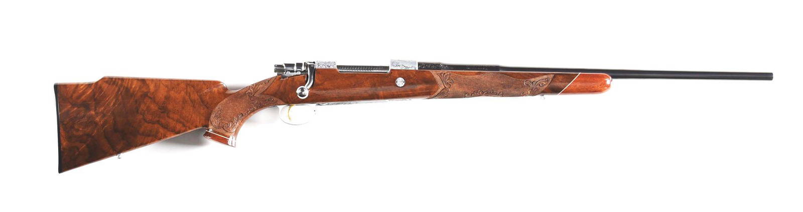 (c) Engraved Browning Medallion Bolt Action Rifle.