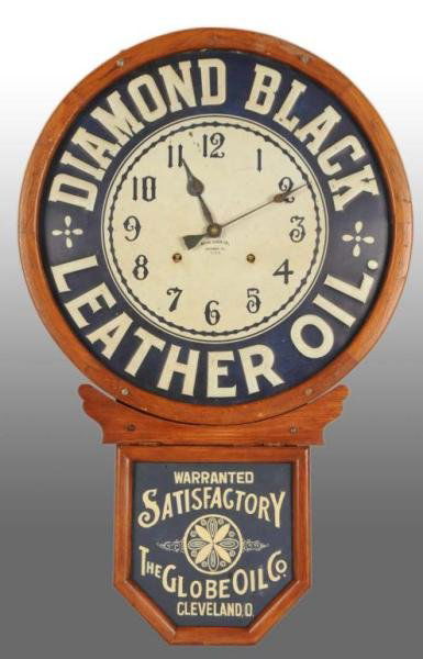 87: Baird Diamond Black Leather Oil Advertising Clock.