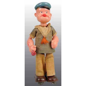 Celluloid Popeye The Rioter Wind Up Toy.