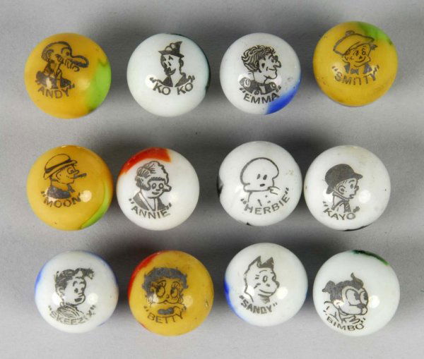 2362: Lot of 12: Peltier Cartoon Character Marbles.