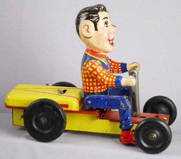 333: Tin Wind-Up Hump Mobile Toy.