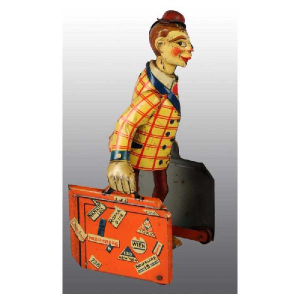65: Tin Distler Baggage Handler Wind-Up Toy.