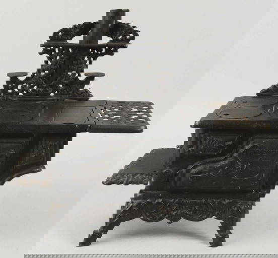 Cast Iron Reproduction Crescent Children's Stove.