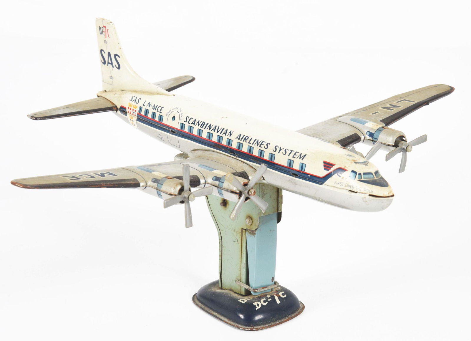 Yonezawa Tin Scandinavian Airlines Douglas Dc 7c With Trigger Stand.