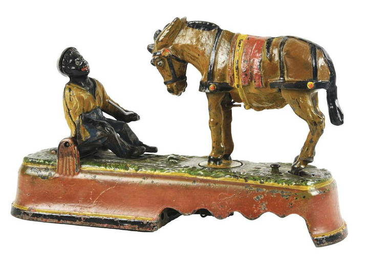 'spise A Mule Boy On Bench Mechanical Bank.