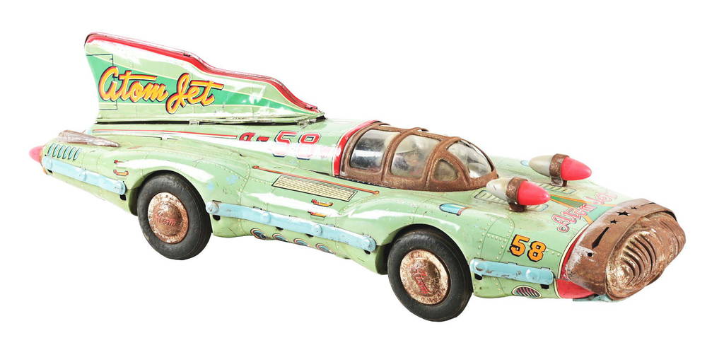 Japanese Tin Litho Friction Atom Jet Race Car.