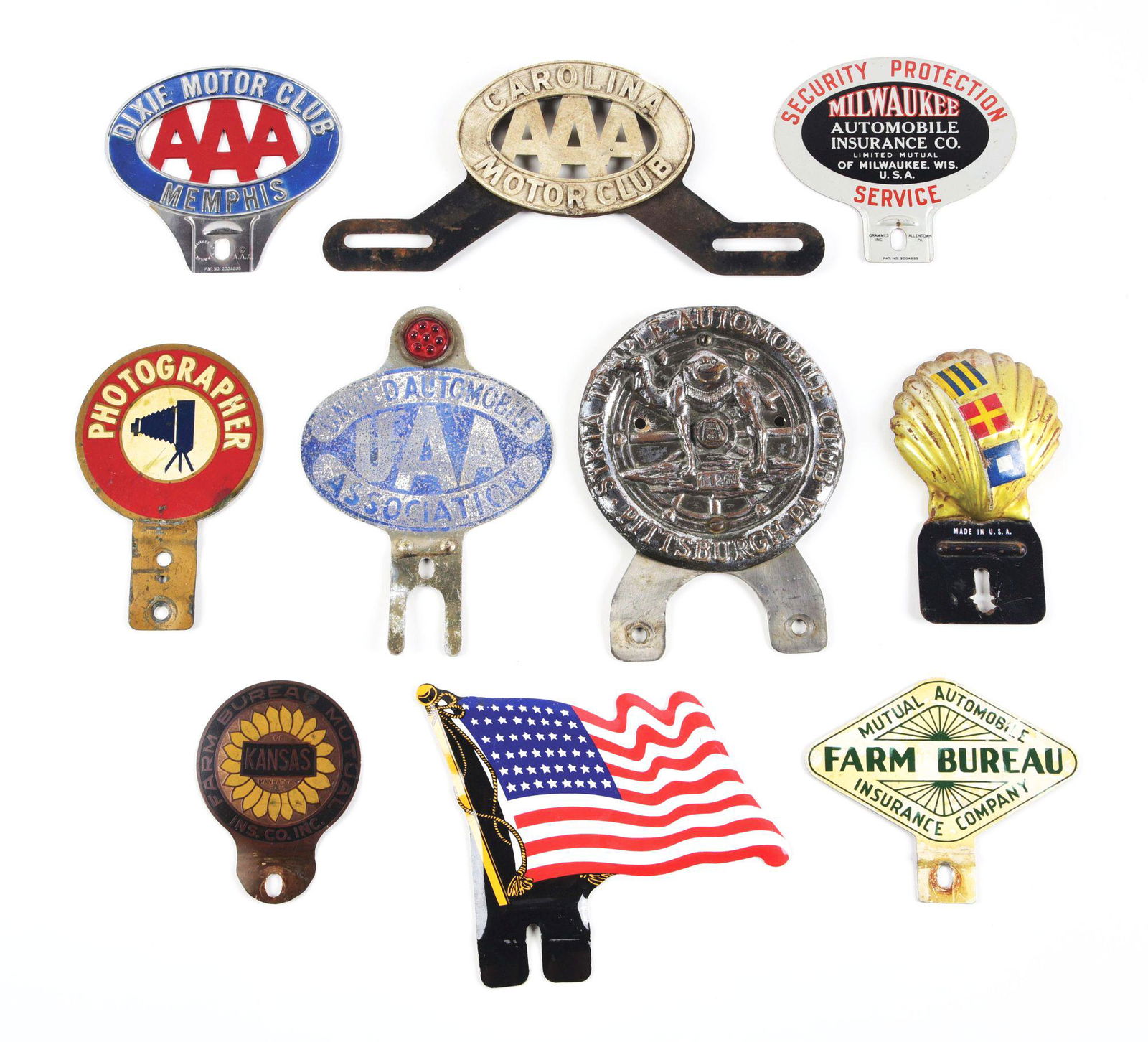 Collection Of Ten Various Tin License Plate Toppers W/ Brackets. Auction