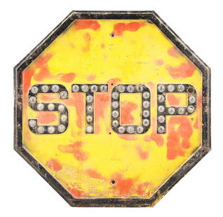 Red Metal Stop Sign With Glass Reflective Marbles.